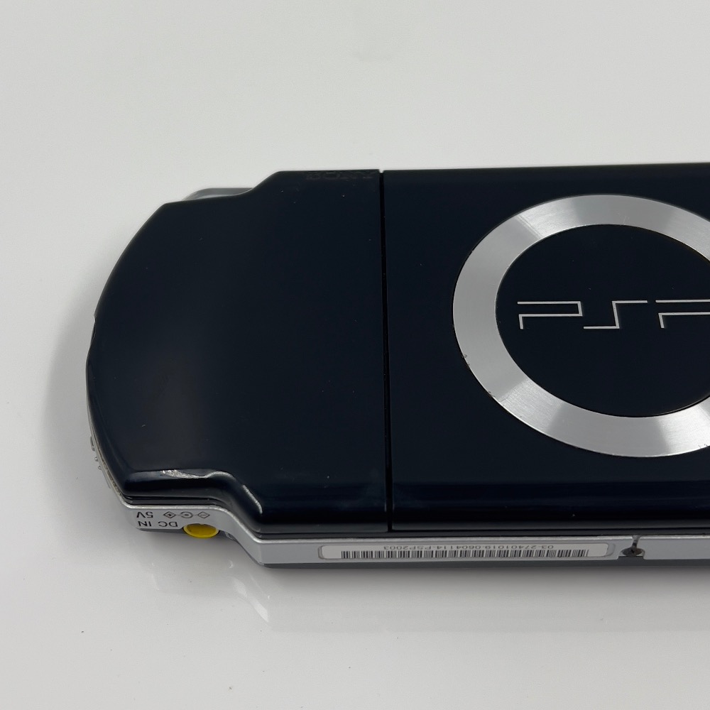 Pre-owned SONY PLAYSTATION PSP 2003 PIANO BLACK WITH CHARGER - Own4Less